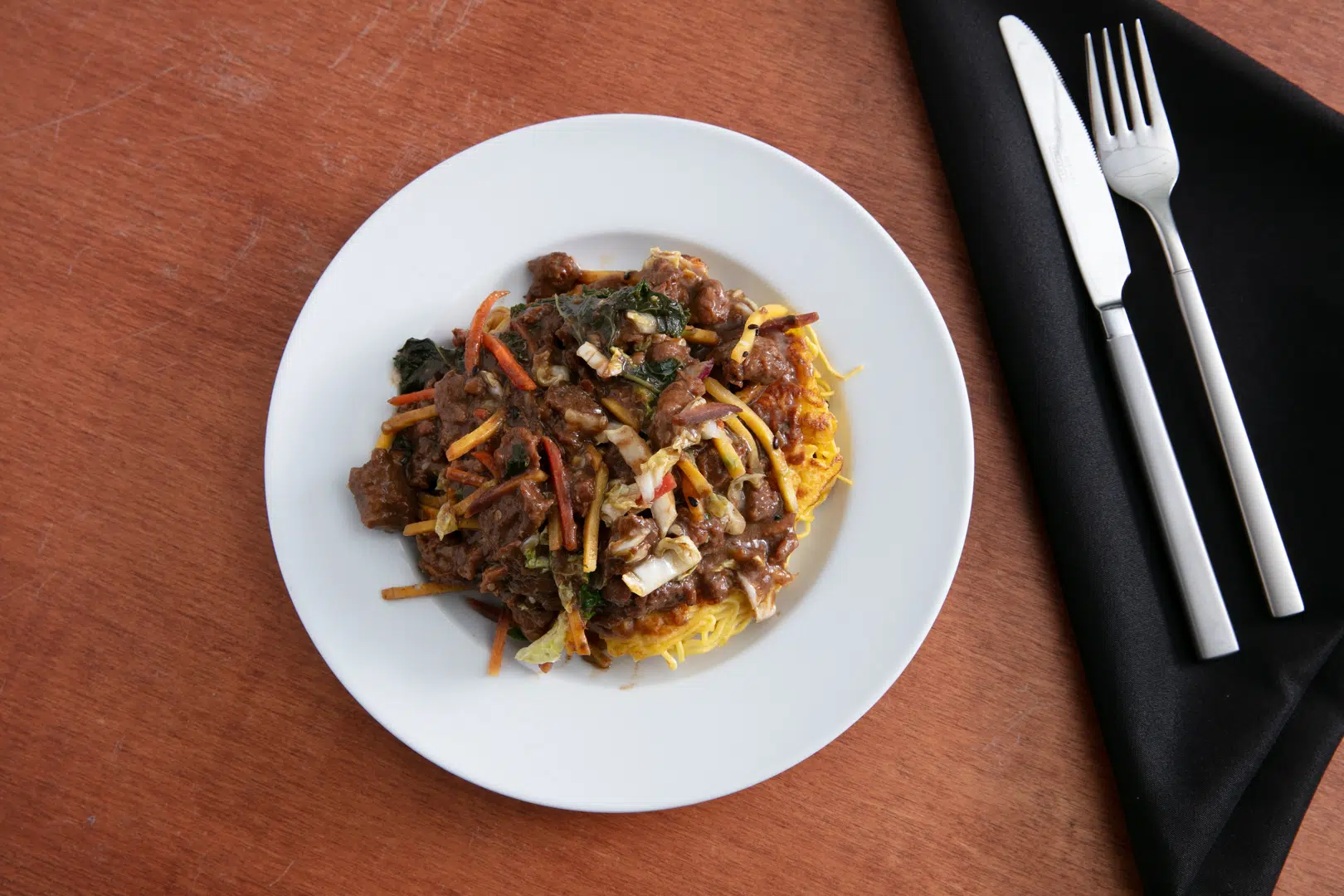 Crispy Golden Noodle Cake with Savory Beef & Bok Choy - Gordon Food Service